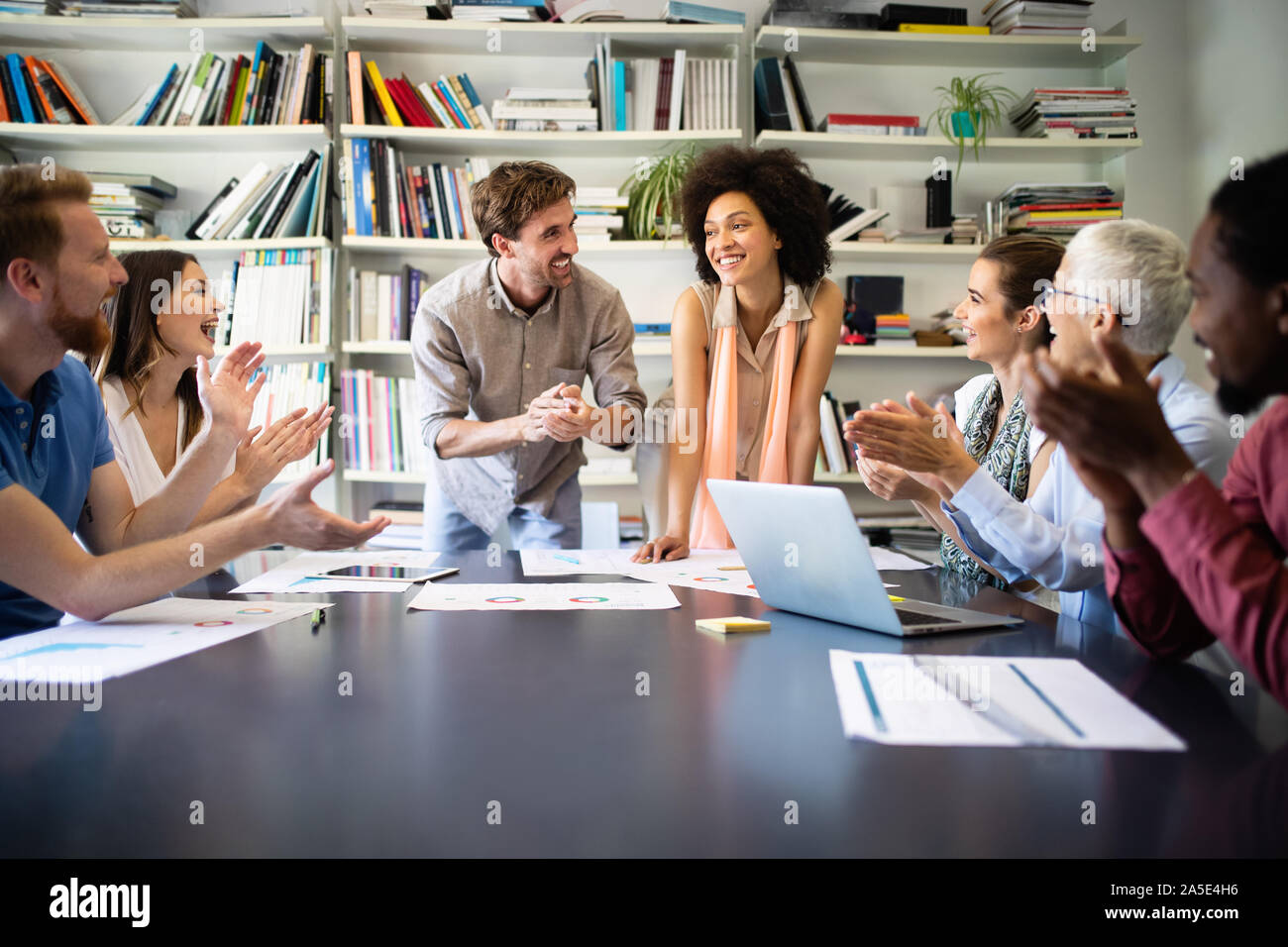 Successful group of business people at work in office Stock Photo - Alamy