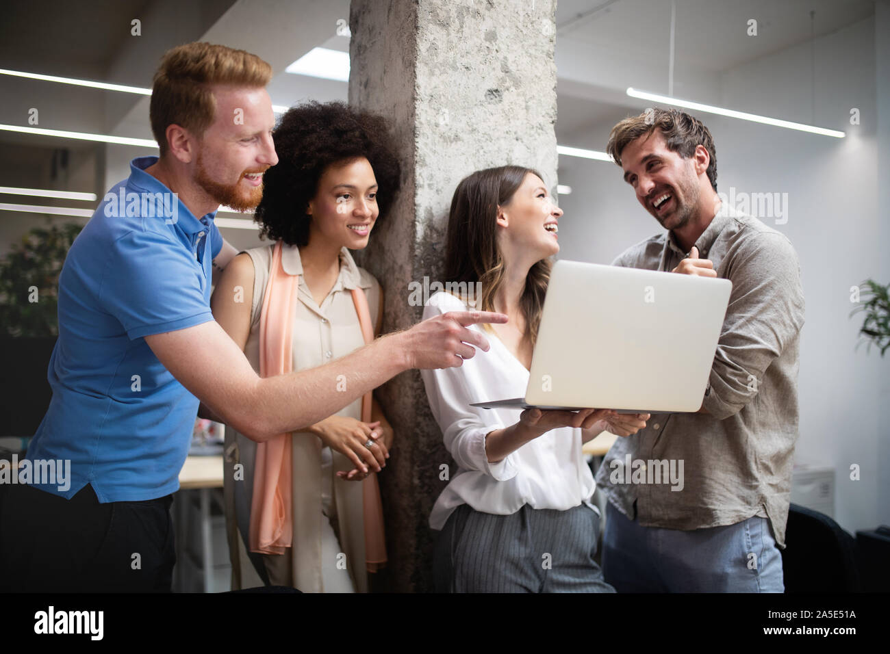 Programmer working in a software developing company office Stock Photo ...