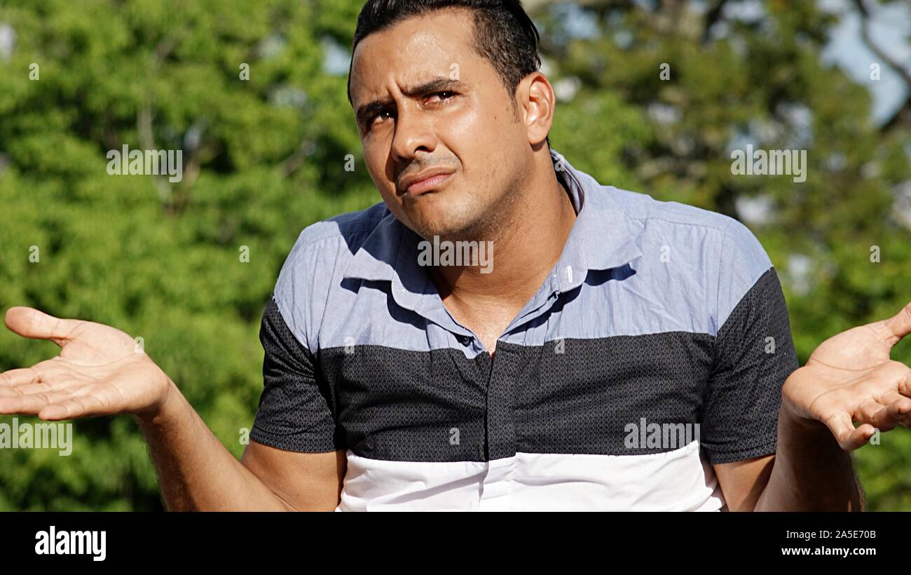 An Undecided Adult Hispanic Male Stock Photo - Alamy