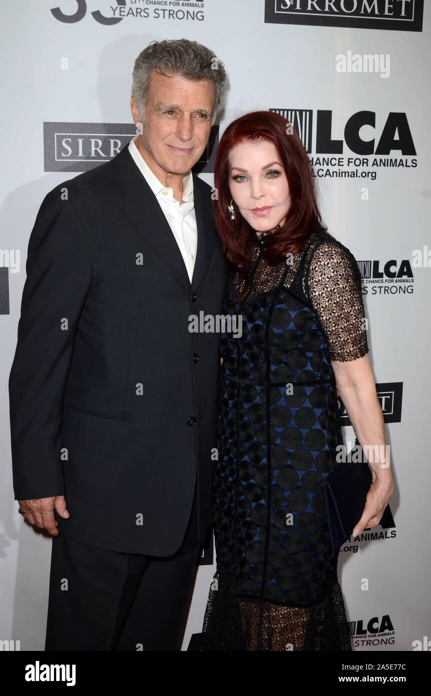 BEVERLY HILLS, CA - OCTOBER 19: Chris DeRose, Priscilla Presley at the ...