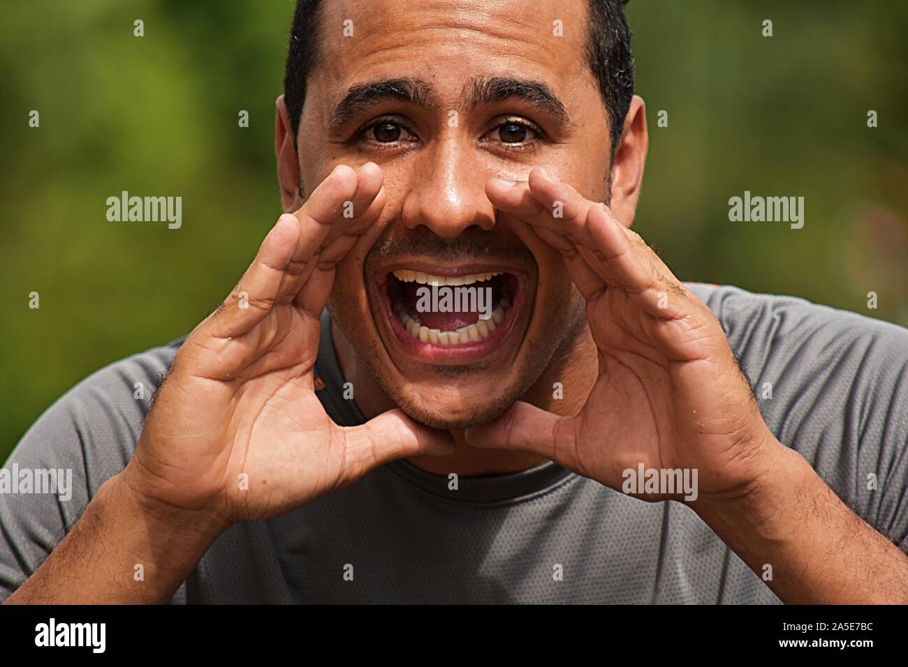 An Adult Male Athlete Yelling Stock Photo - Alamy