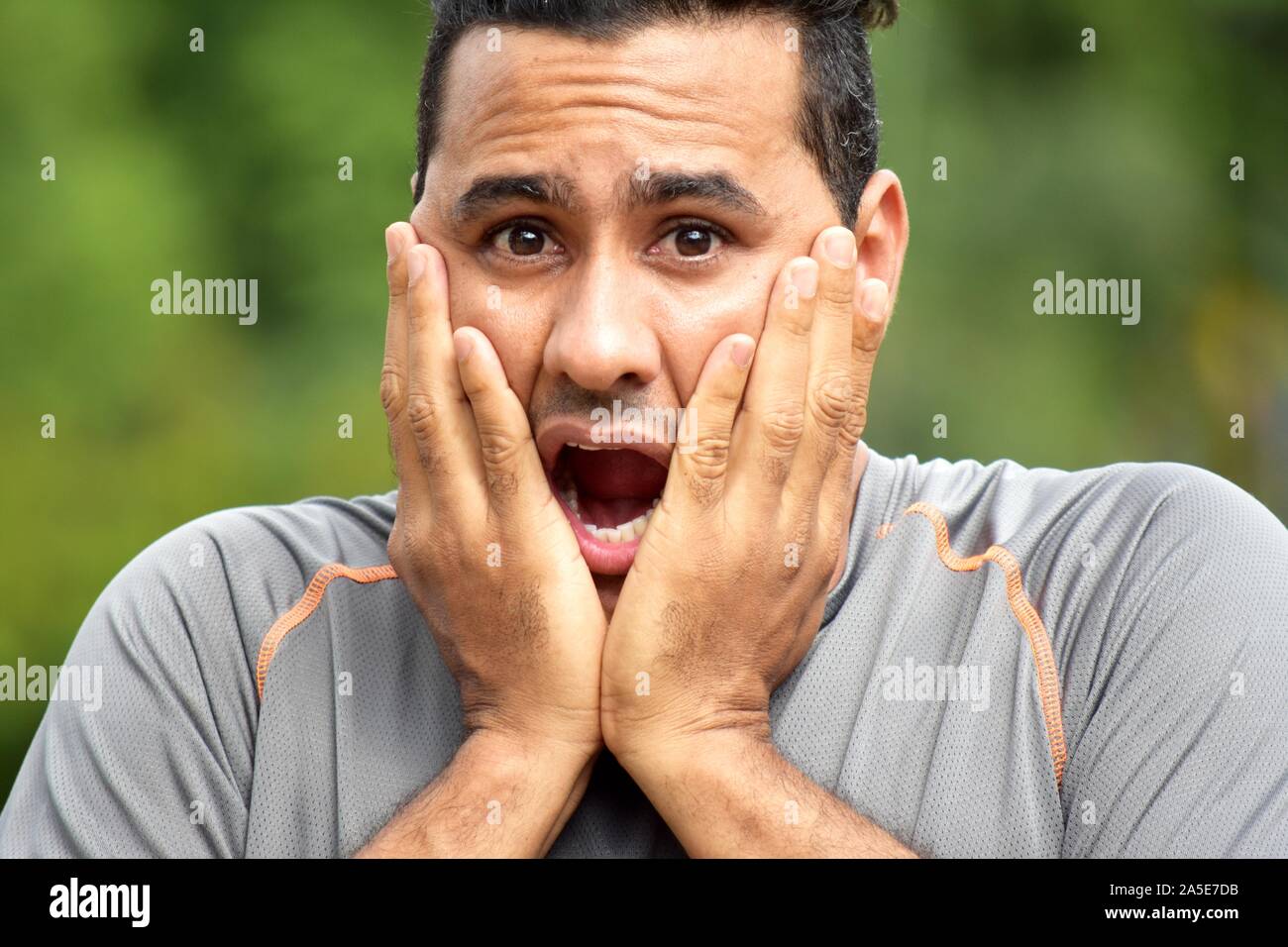 Startled Athletic Man Stock Photo - Alamy