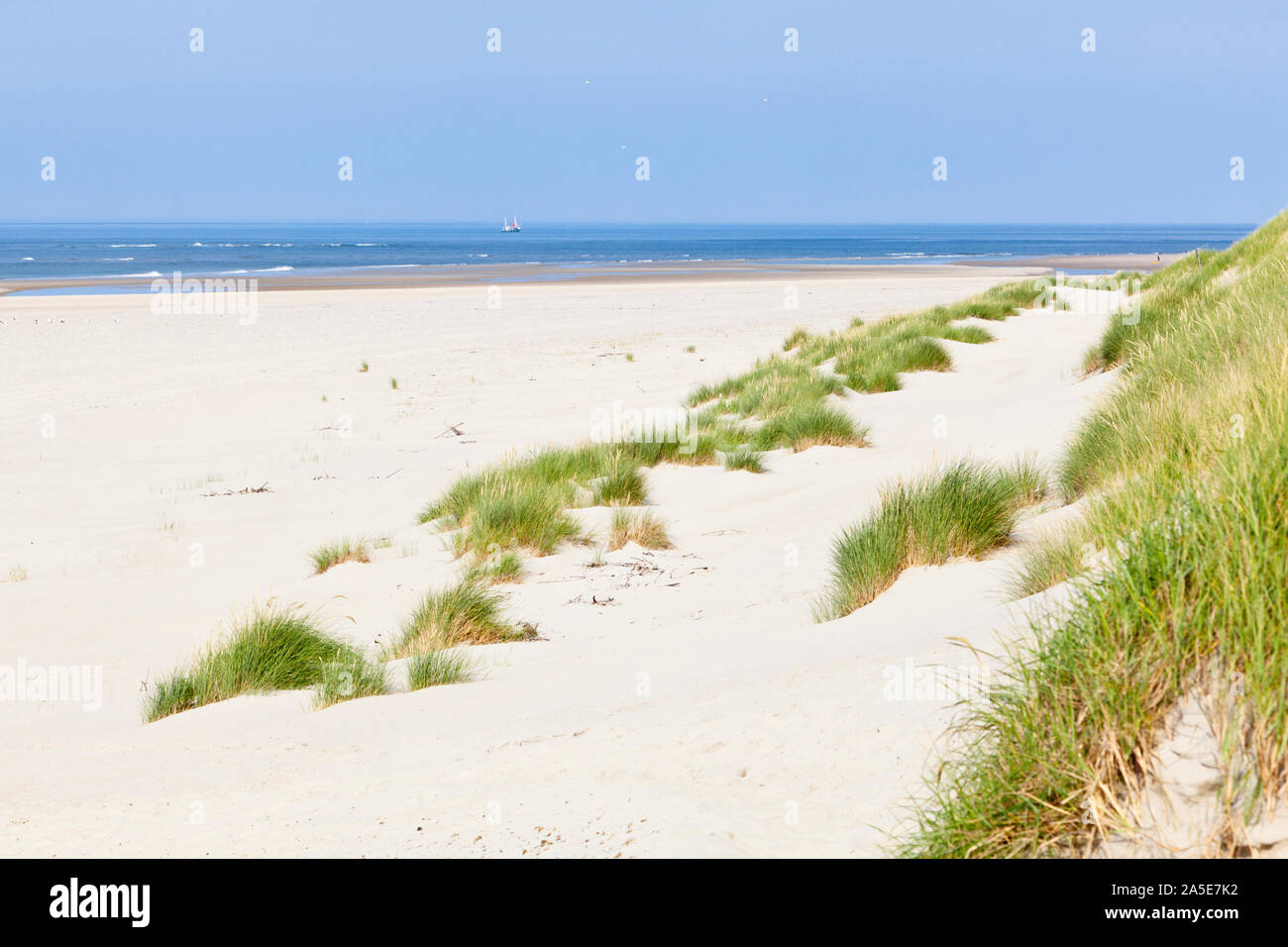 A nearly white beach at the North Sea in Norderney, Germany Stock Photo ...