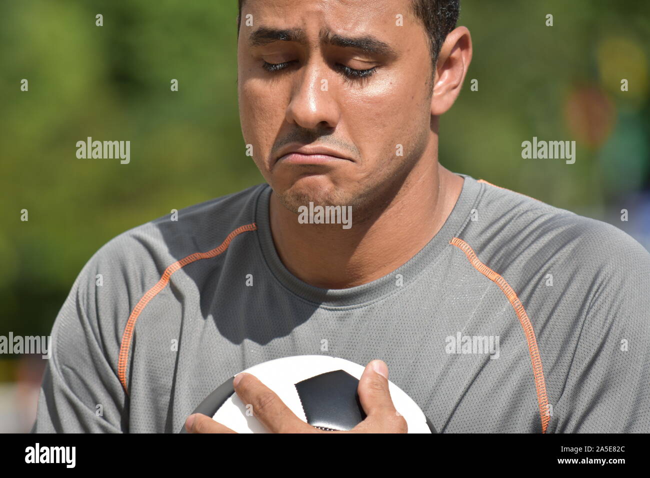 Sad Failed Adult Male Soccer Player Stock Photo - Alamy