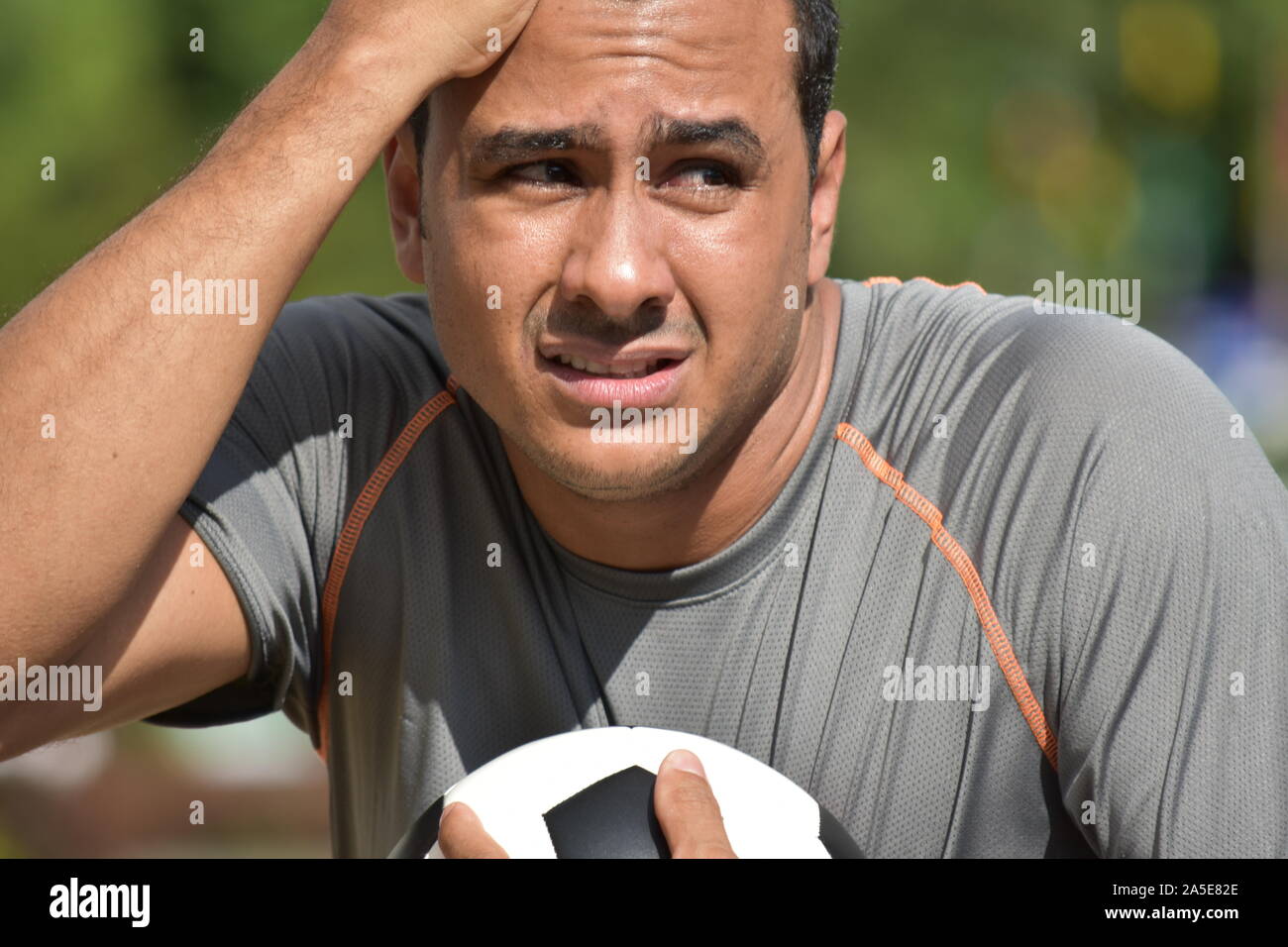 Adult Male Soccer Player And Stress Stock Photo - Alamy