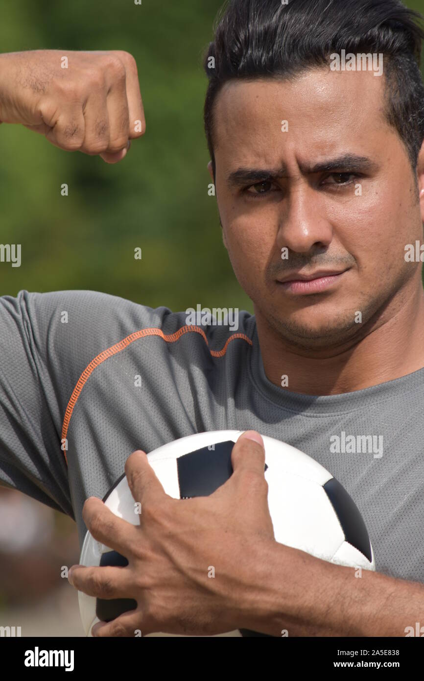 Strong Muscular Adult Male Soccer Player Stock Photo - Alamy