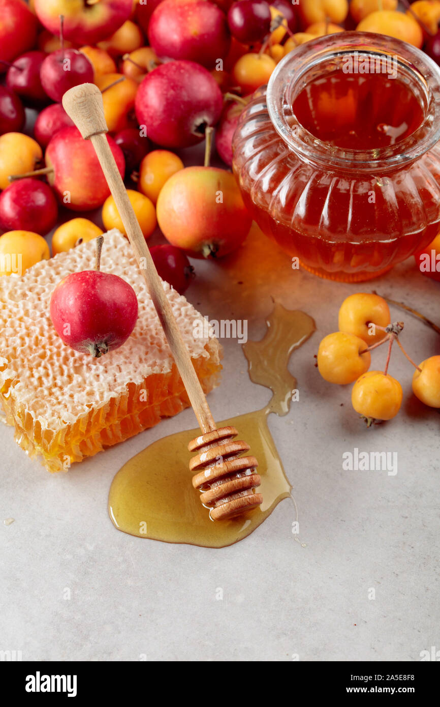 Honey and ripe small wild apples. Red and yellow crab apples, healthy ...