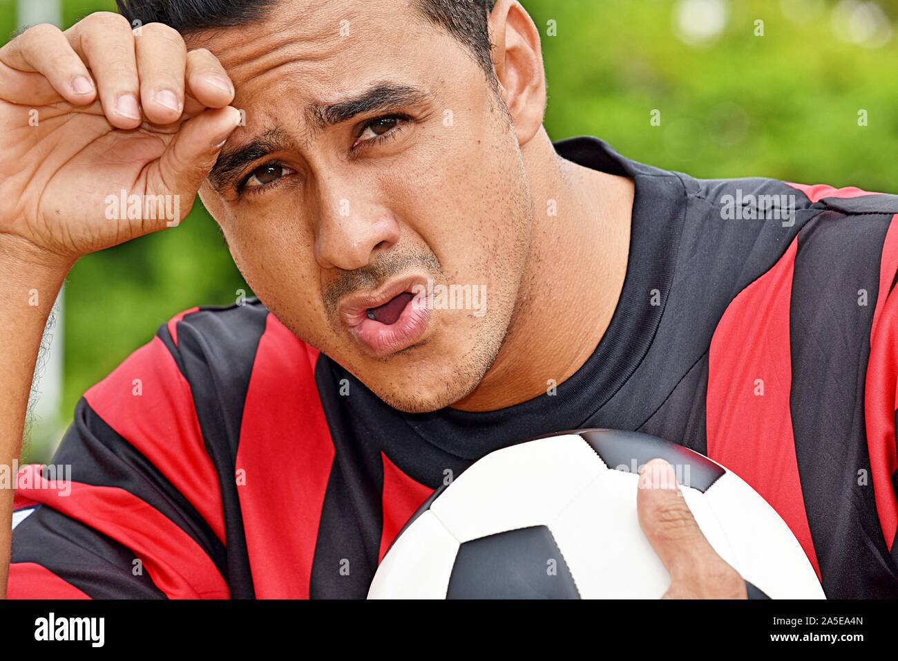 Tired Adult Male Soccer Player Stock Photo - Alamy