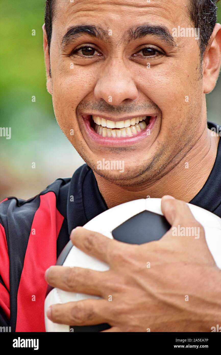 Soccer player smiling hi-res stock photography and images - Alamy