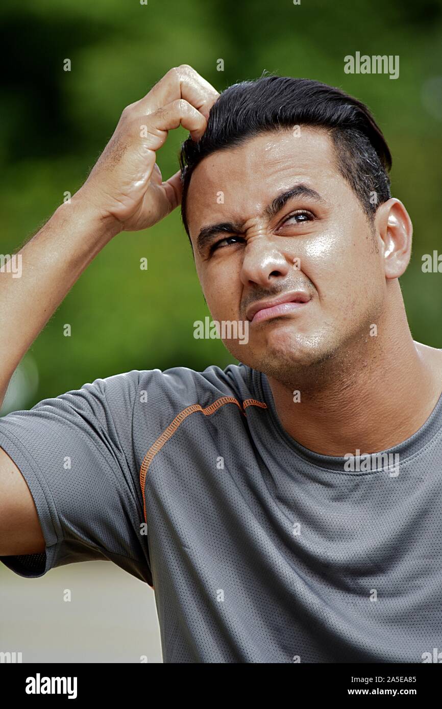 Male Athlete And Confusion Stock Photo - Alamy