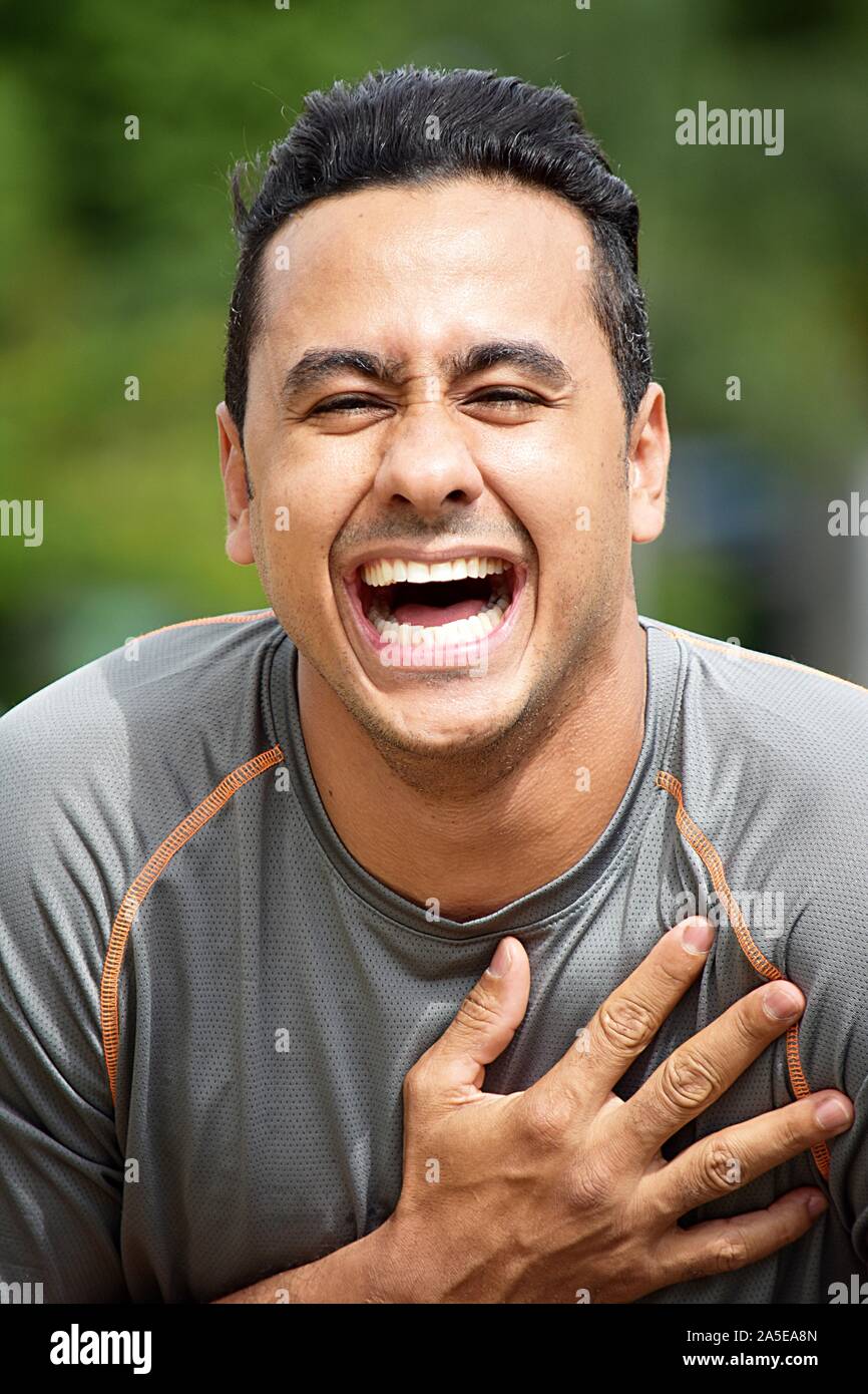 An Adult Male Athlete Laughing Stock Photo - Alamy