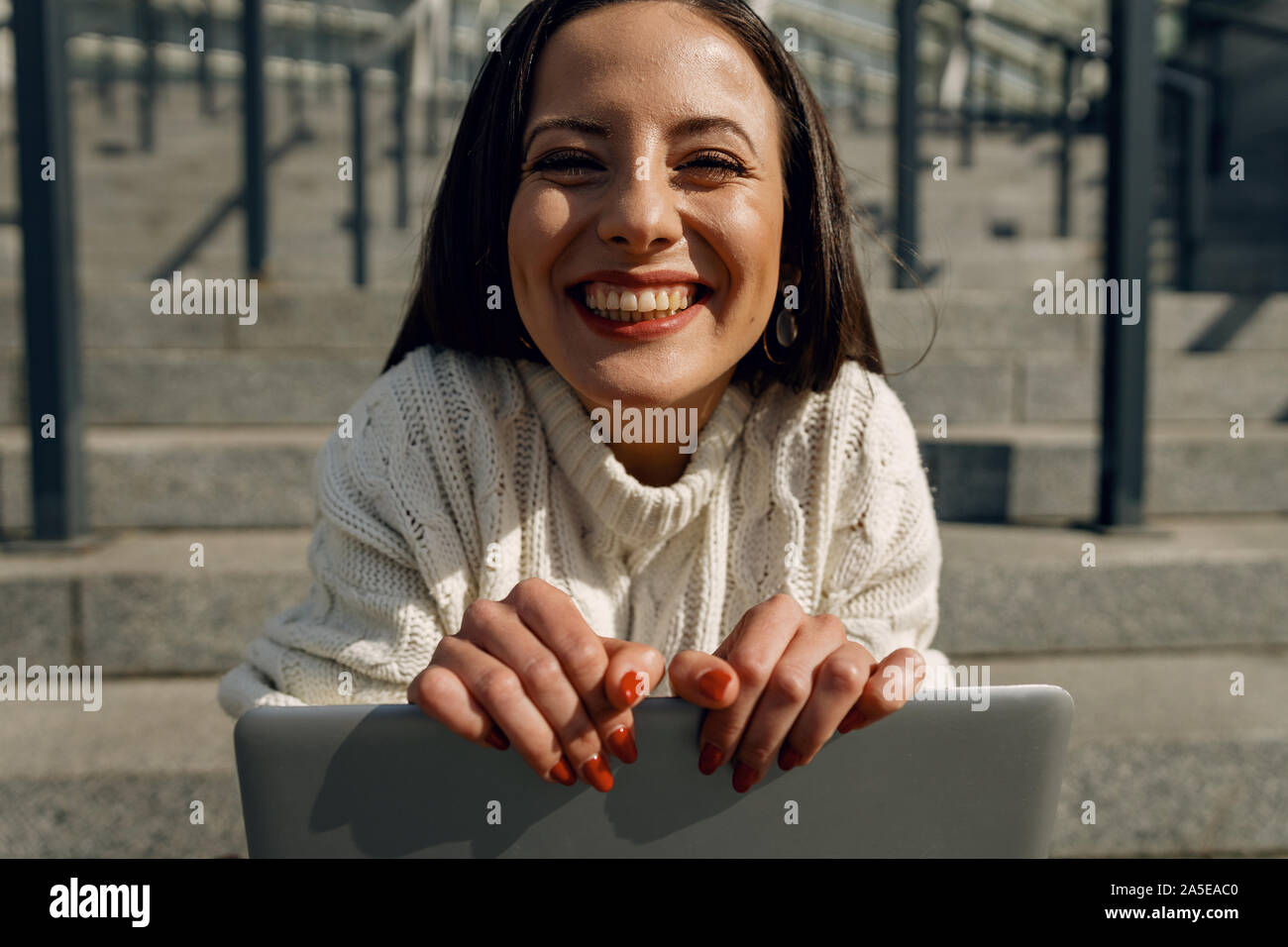 I am ready. Pleased woman keeping smile on her face while staring at ...