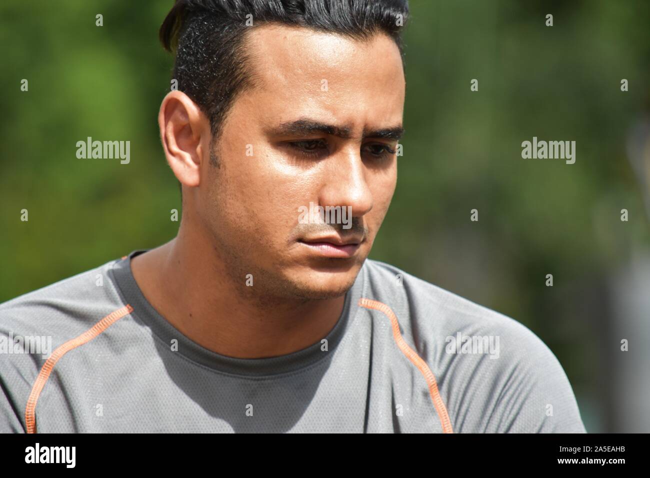 Sad Male Athlete Stock Photo - Alamy