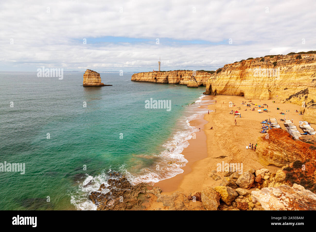 beach on the algarve coast rock stack formation and outcrop Stock Photo ...