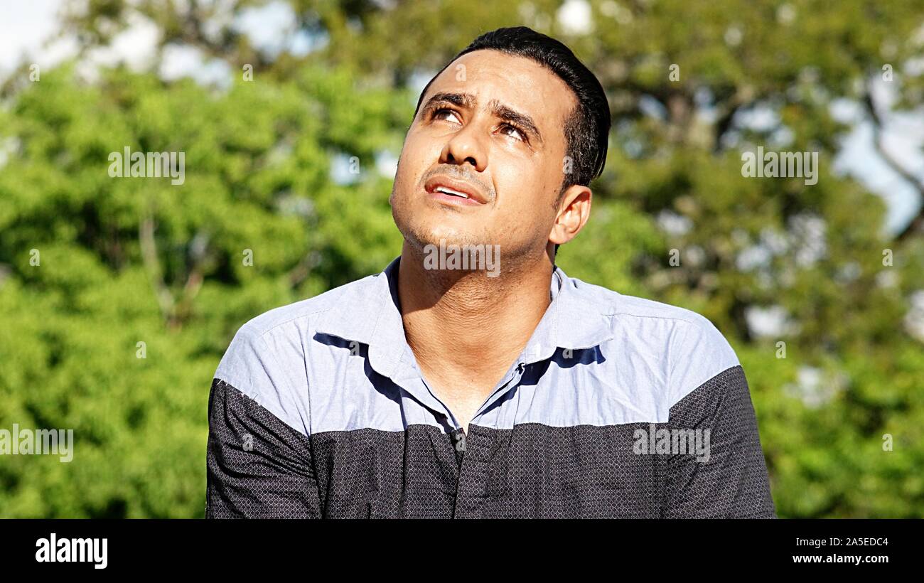 Thoughtful Adult Hispanic Male Stock Photo - Alamy