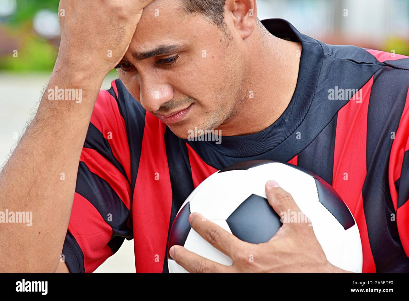Sad soccer adult hi-res stock photography and images - Alamy