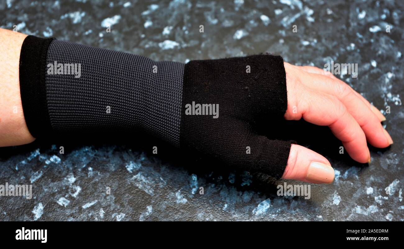 Wrist and thumb support Stock Photo - Alamy