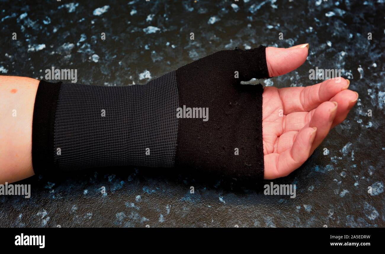 Wrist and thumb support Stock Photo - Alamy