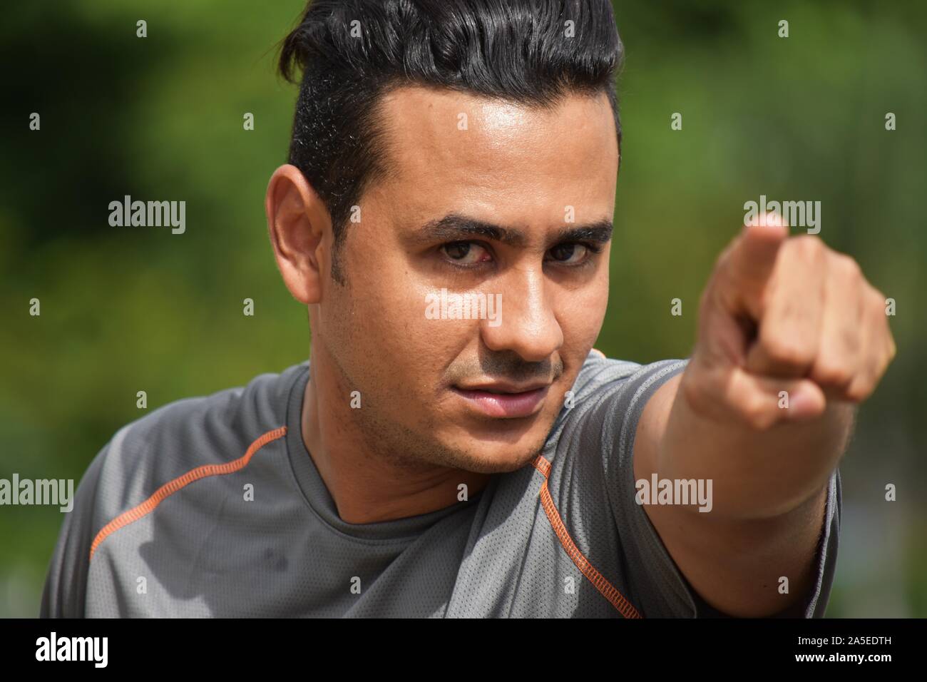 Male Athlete Pointing Stock Photo - Alamy