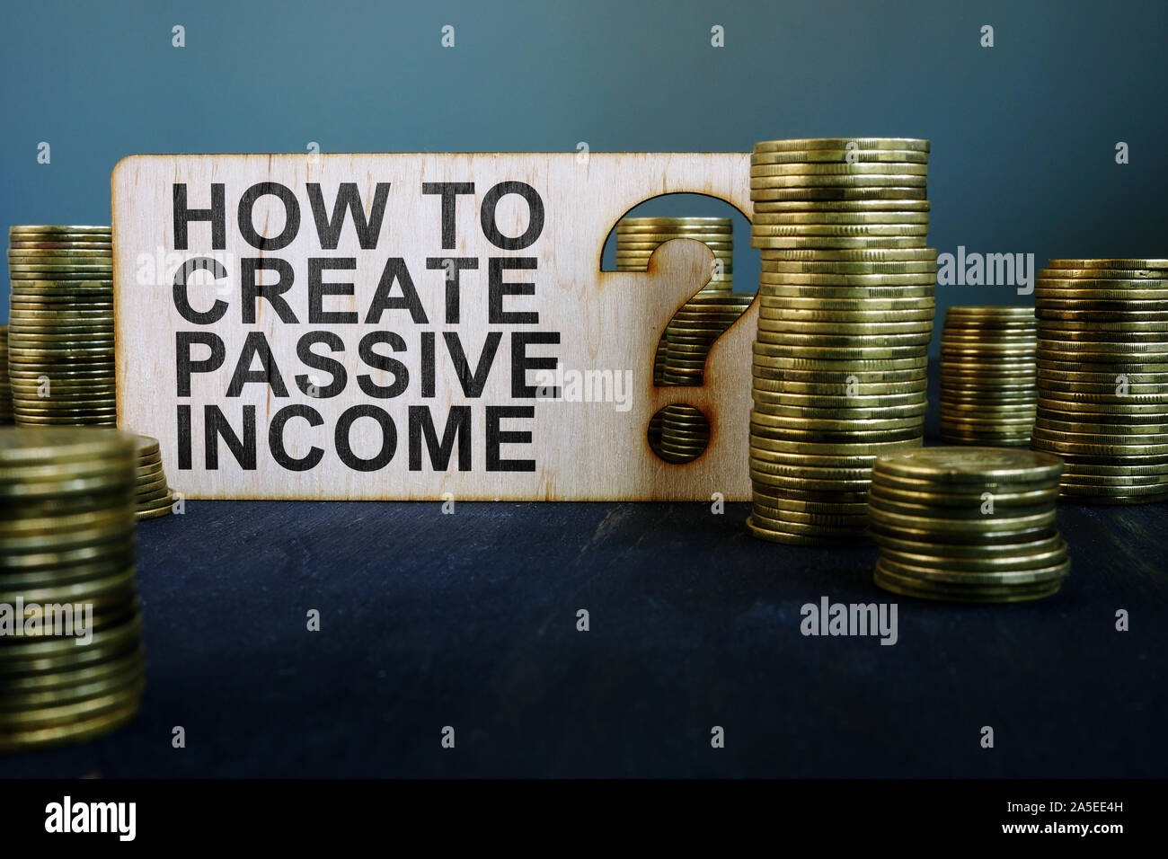 How to create passive income sign and coins Stock Photo - Alamy