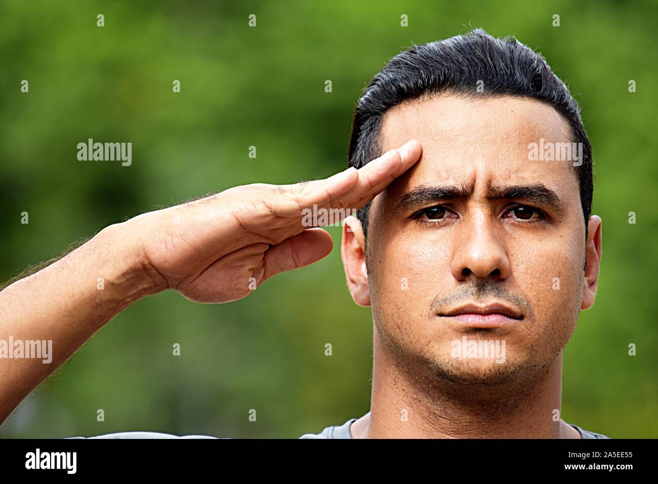 Saluting Civilian Adult Hispanic Male Stock Photo - Alamy
