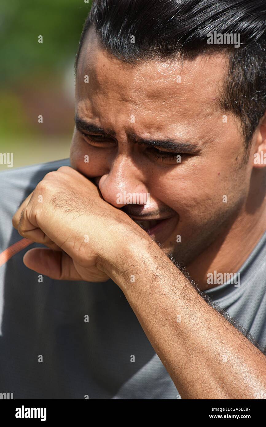 Crying Athletic Man Stock Photo - Alamy