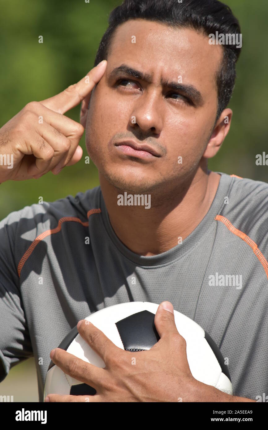 An Adult Male Soccer Player Thinking Stock Photo - Alamy