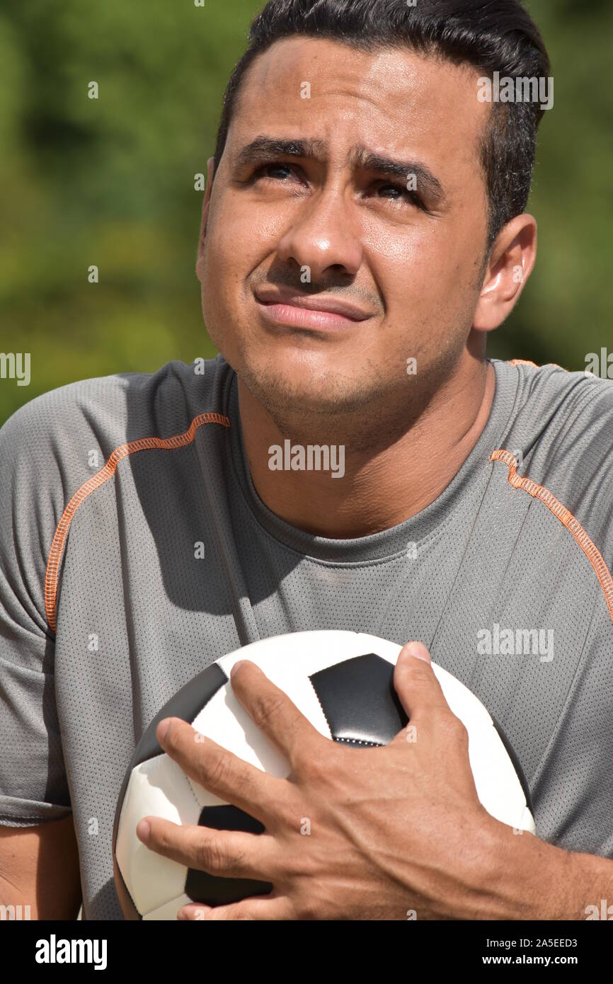 Adult Male Soccer Player And Confusion Stock Photo - Alamy