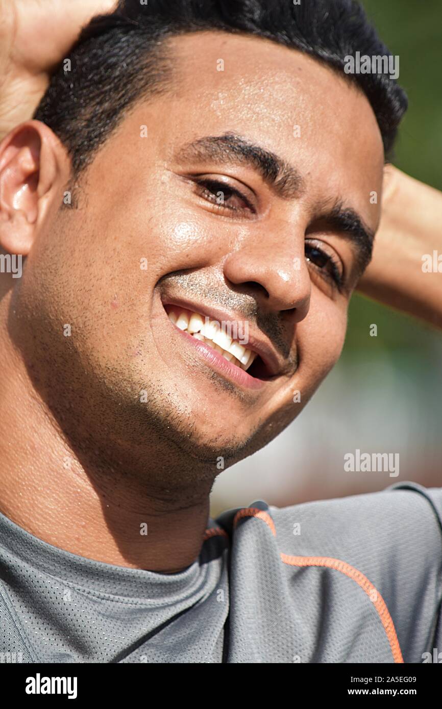 Colombian Male Athlete Relaxing Stock Photo - Alamy