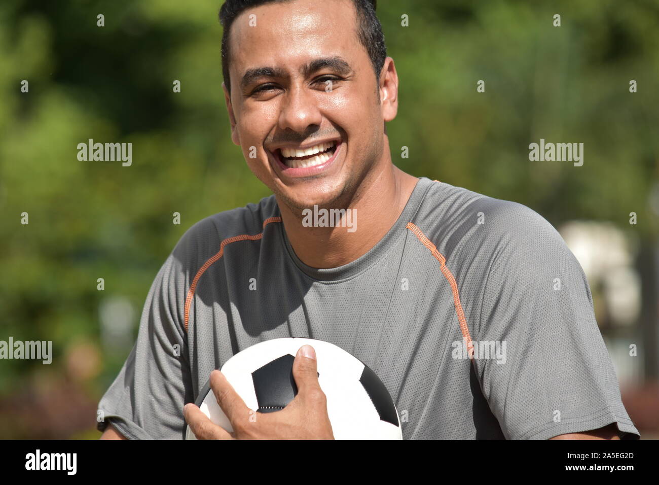 Happy Adult Male Soccer Player Stock Photo - Alamy