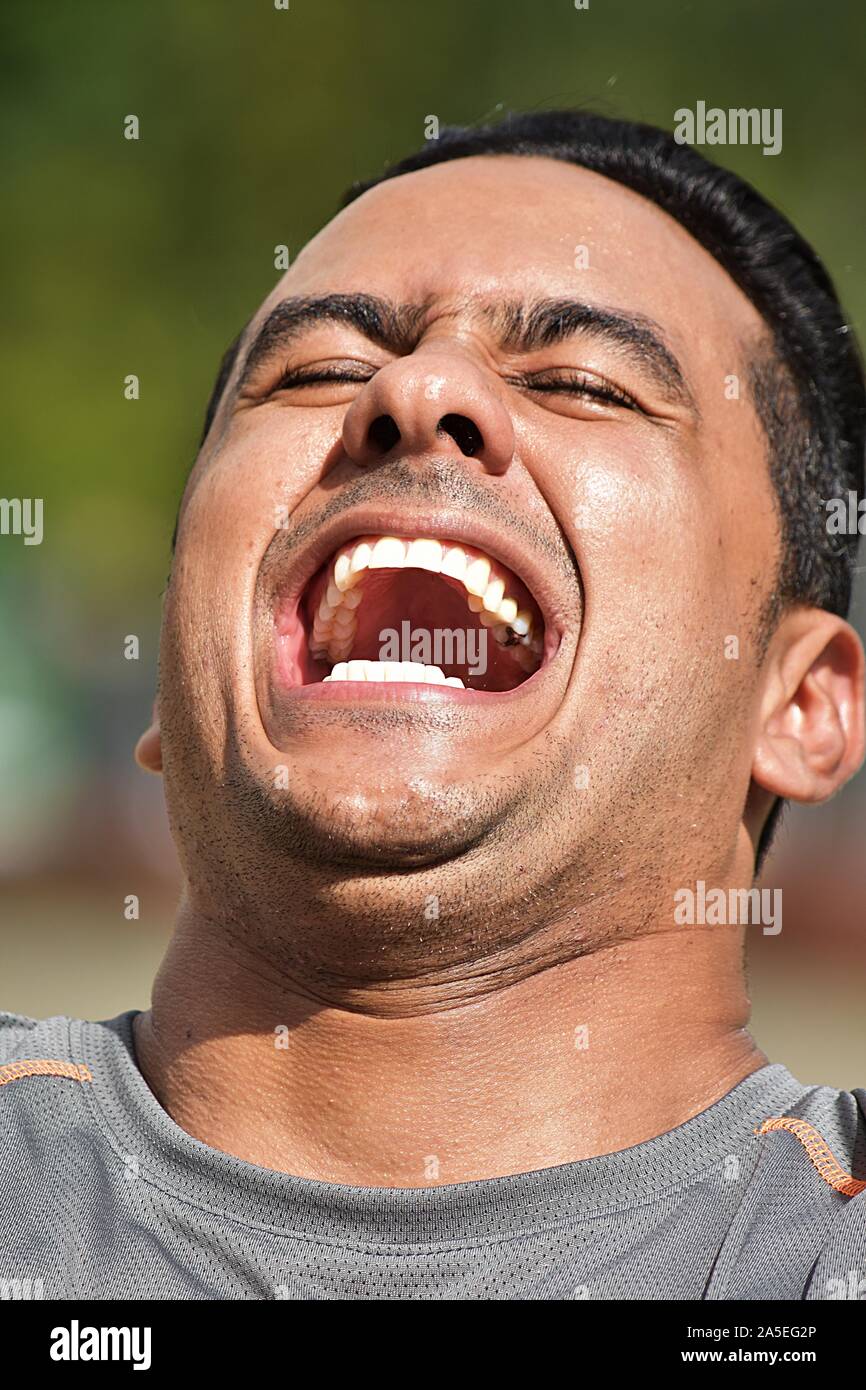 Male Athlete And Laughter Stock Photo - Alamy
