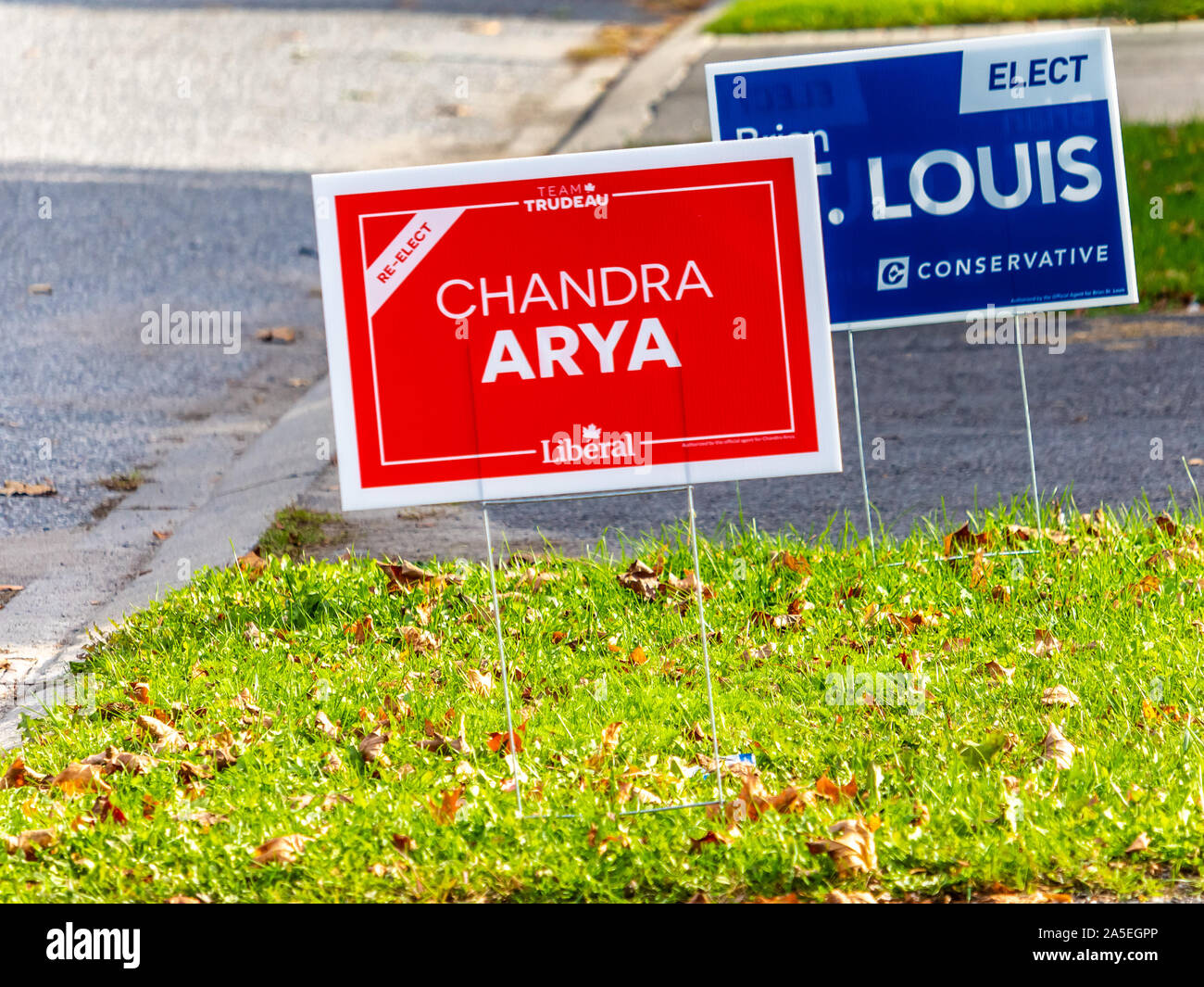 Election signs for the Liberal and Conservative candidates in the ...
