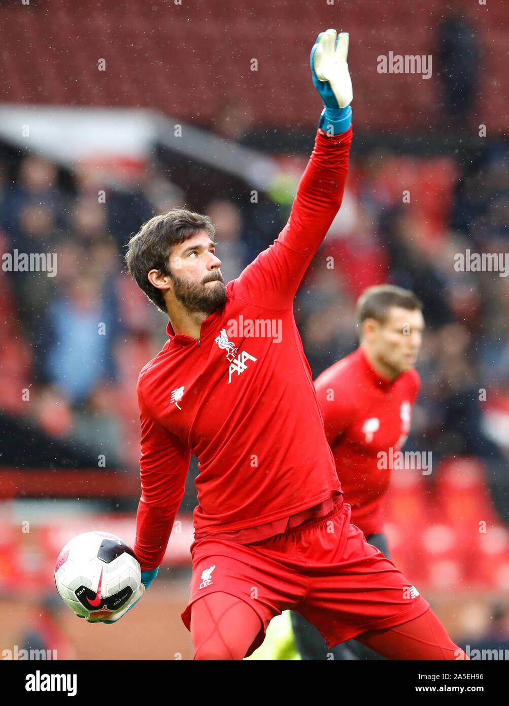 Liverpool goalkeeper alisson warms up hi-res stock photography and ...