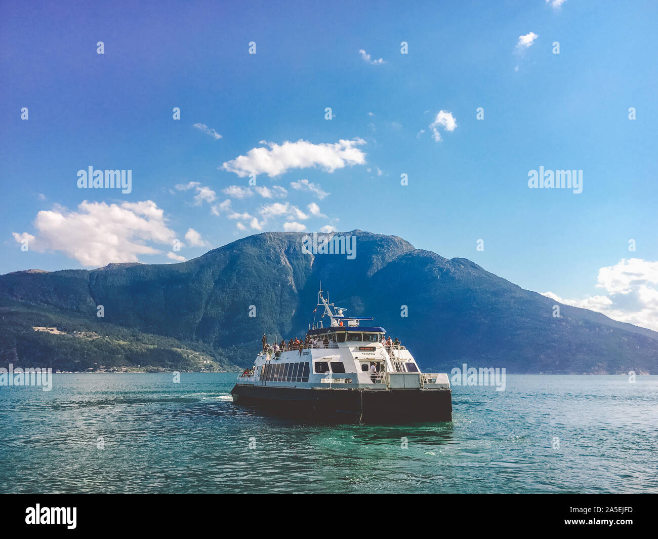 July 27, 2019 Norway. Utne. Ferry boat transportation Norway. White ...