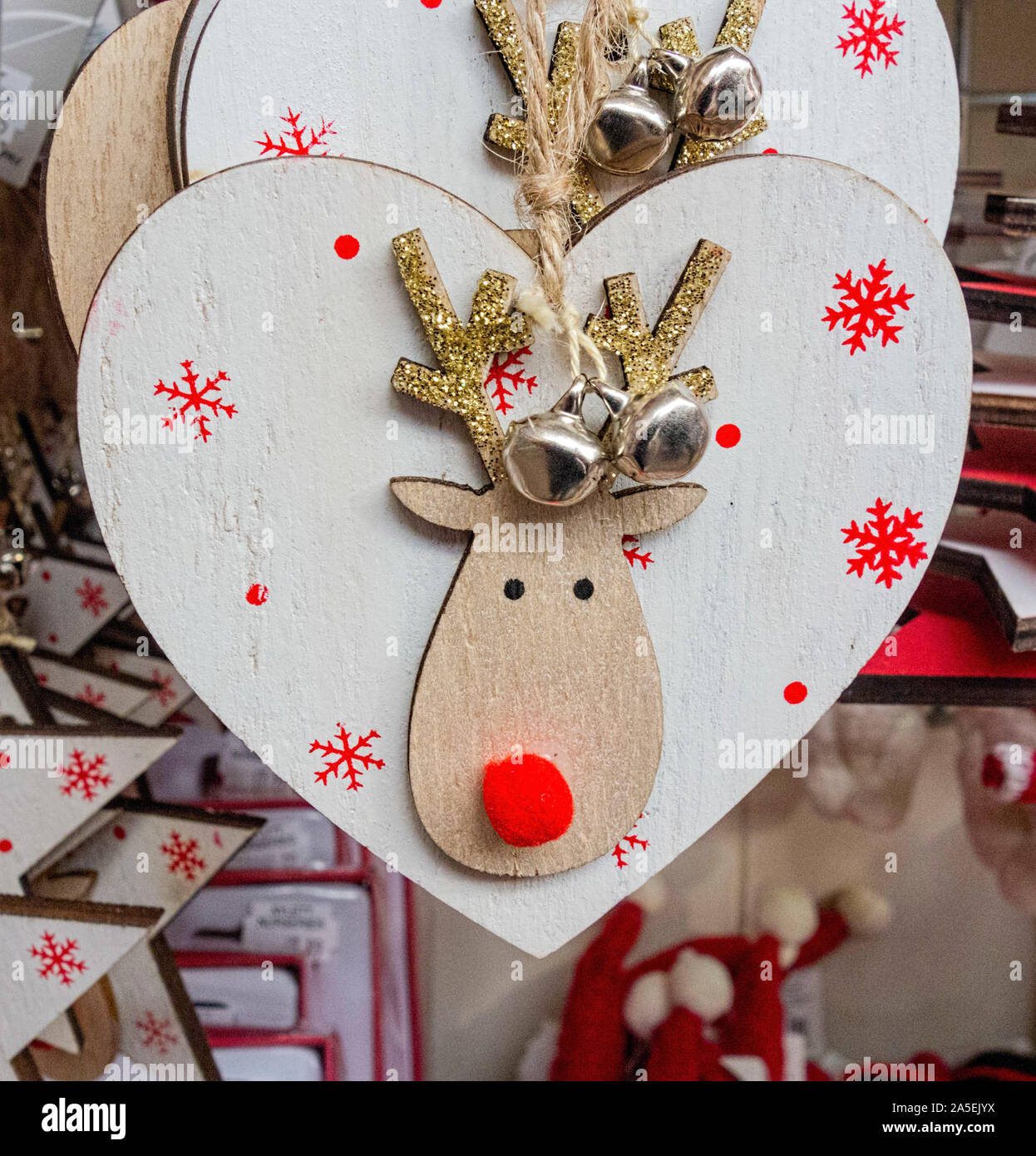 Rudolph reindeer on wooden heart hi-res stock photography and images ...