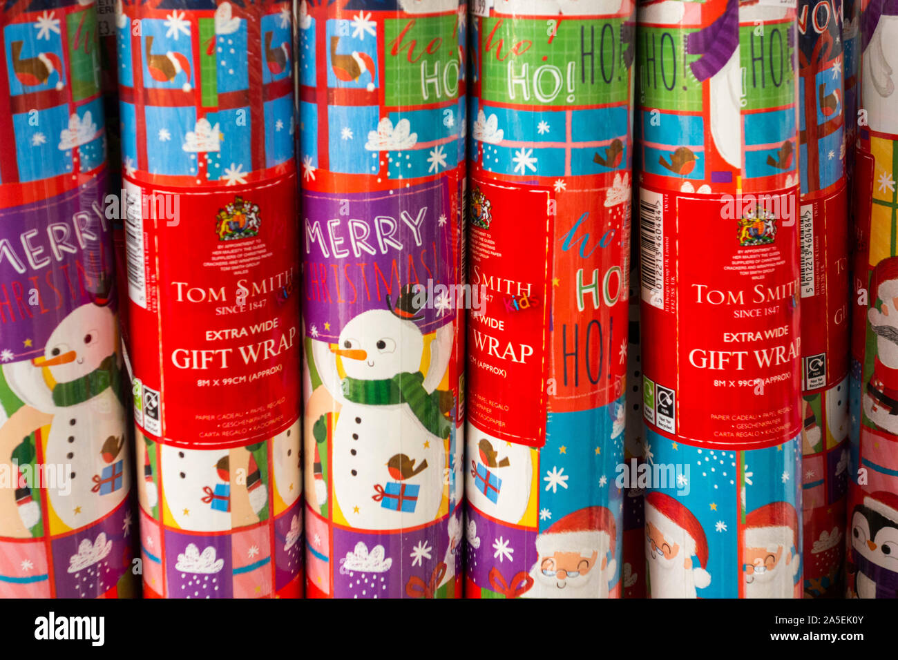 Rolls of Christmas wrapping paper Stock Photo - Alamy
