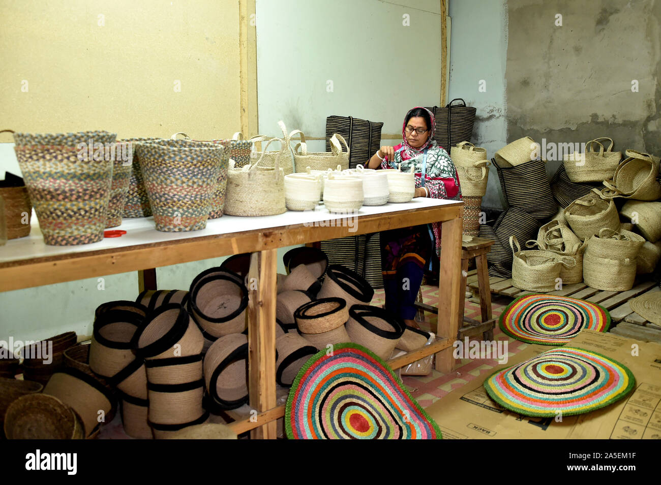 Gazipur, Bangladesh. 20th Oct, 2019. A woman makes jute rope ...