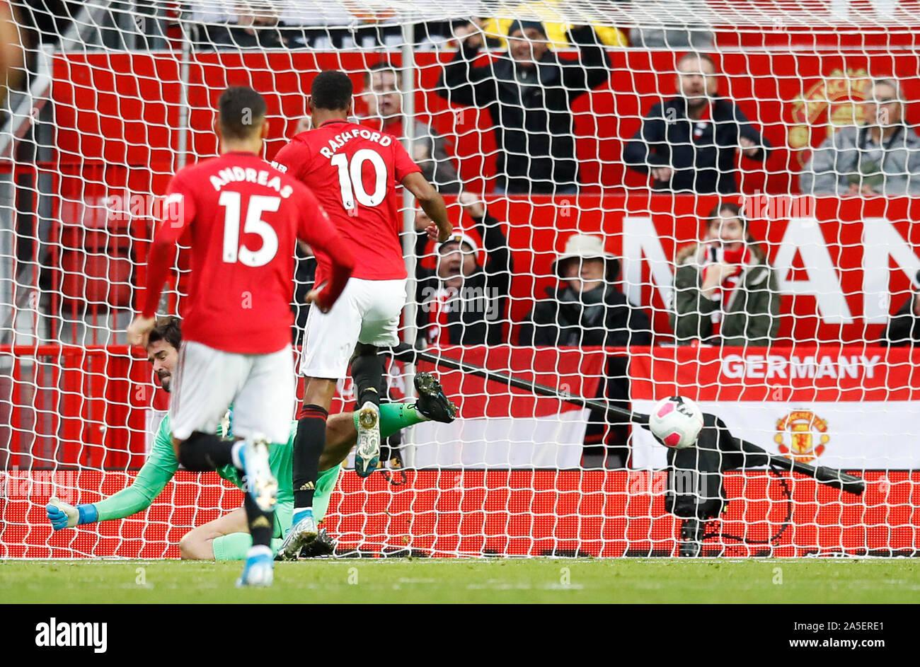 Manchester United's Marcus Rashford scores his side's first goal of the ...