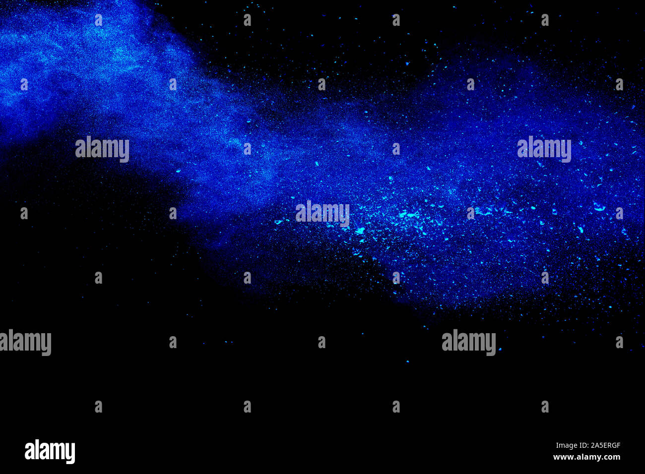 Blue dust explosion on black background. Freeze motion of color powder ...