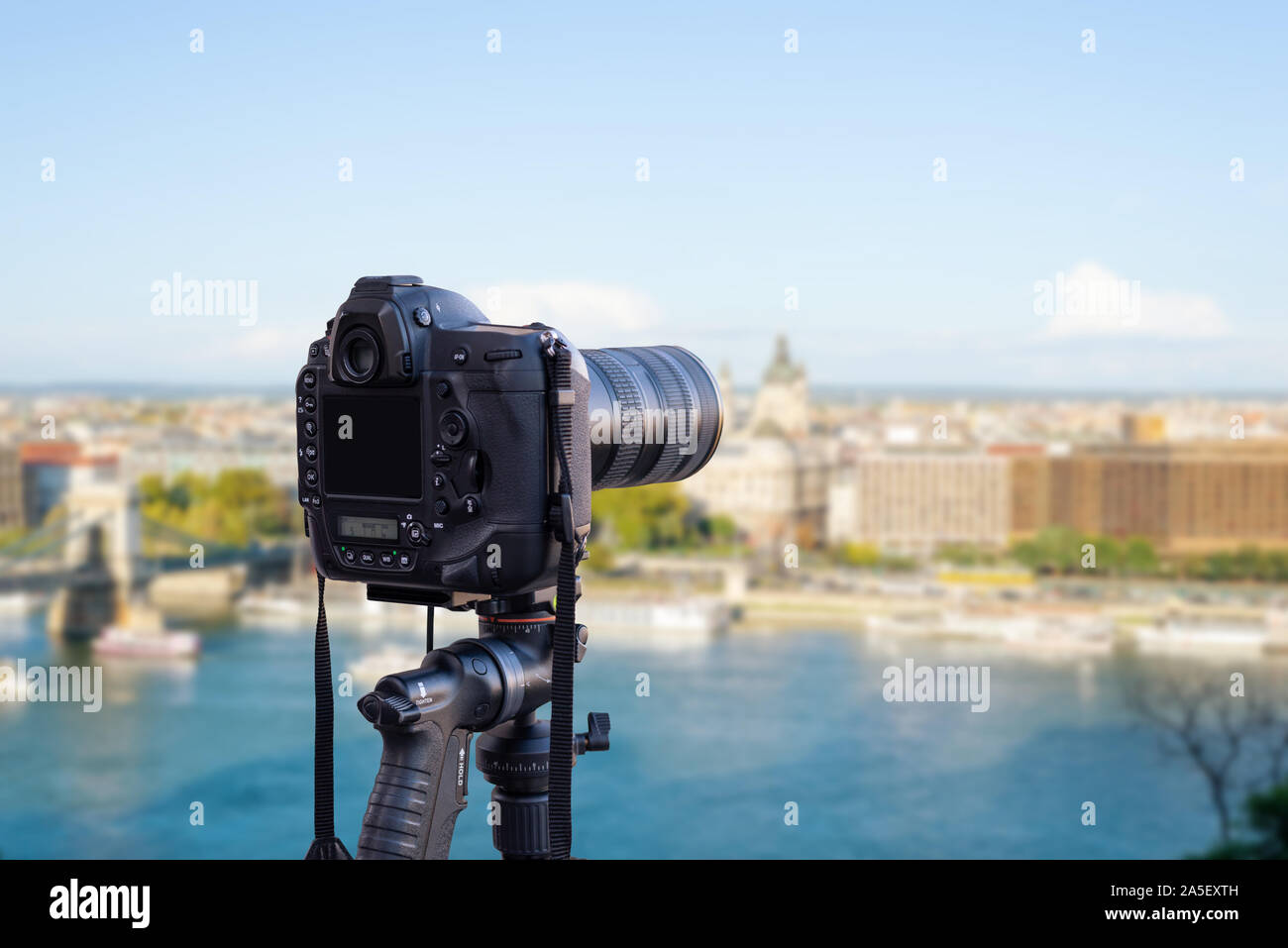 Modern camera photographs the city concept Stock Photo - Alamy