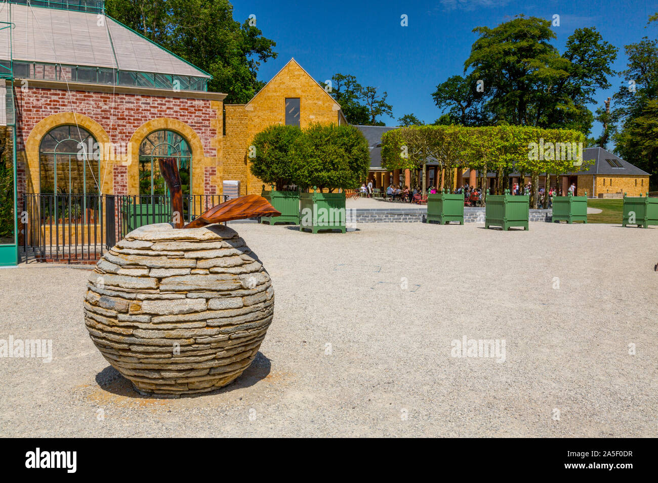 A stone and wood artwork of an apple at the newly restored 'The Newt in ...