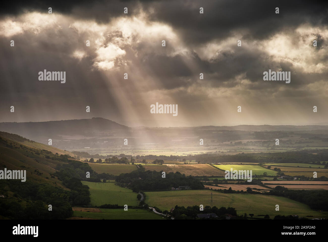 Clouds with light streaming down hi-res stock photography and images ...
