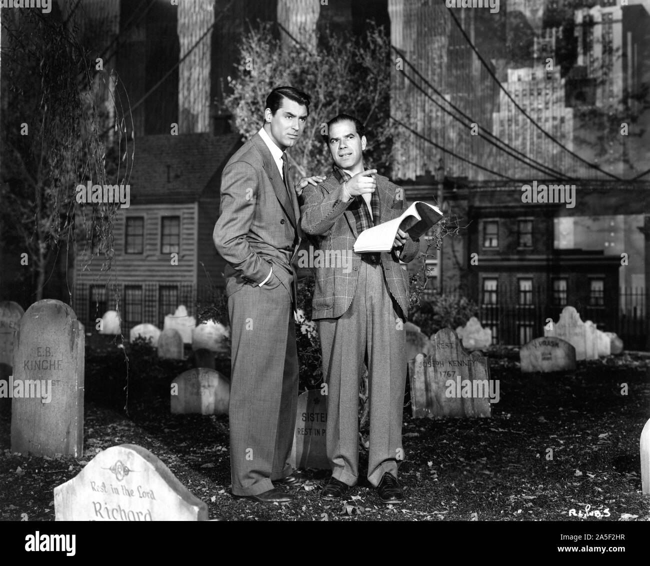 CARY GRANT and Director FRANK CAPRA on set candid during filming ...