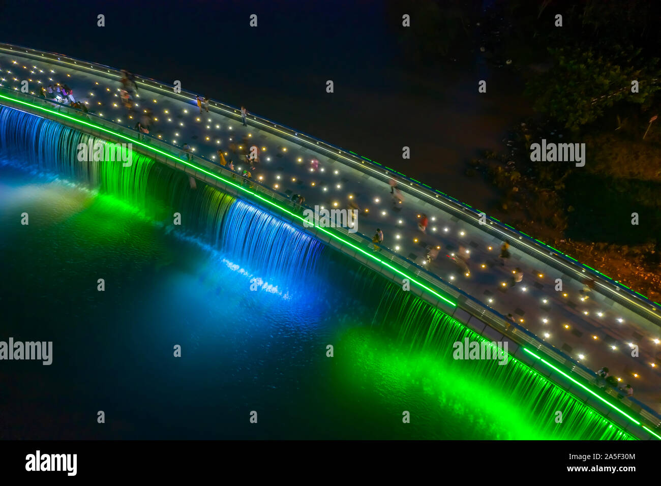 Anh Sao or Starlight Bridge is a pedestrian bridge with waterfall and ...