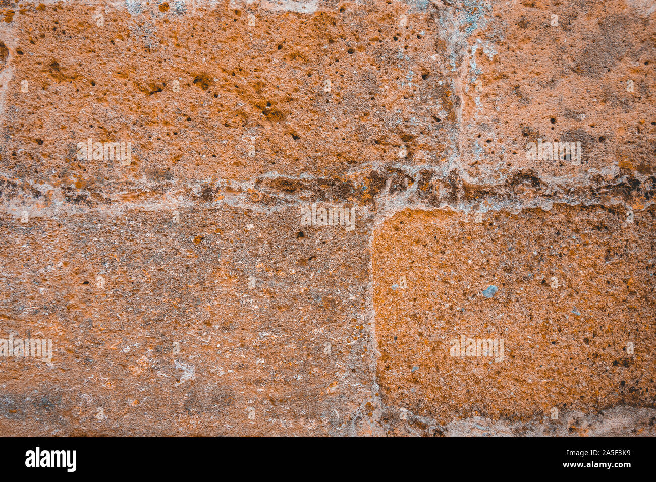 brick facade in warm colors Stock Photo - Alamy
