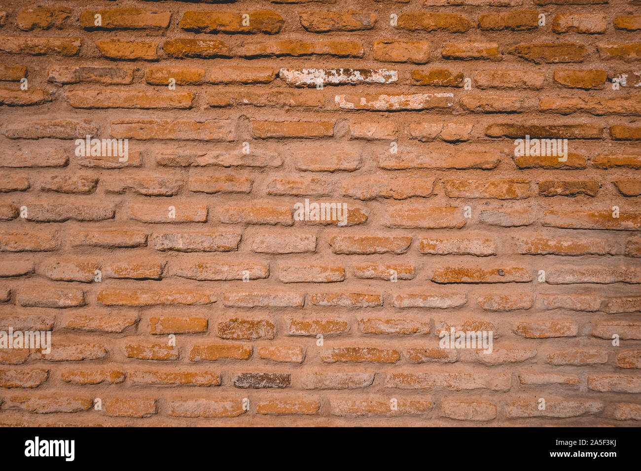 brick facade in warm colors Stock Photo - Alamy