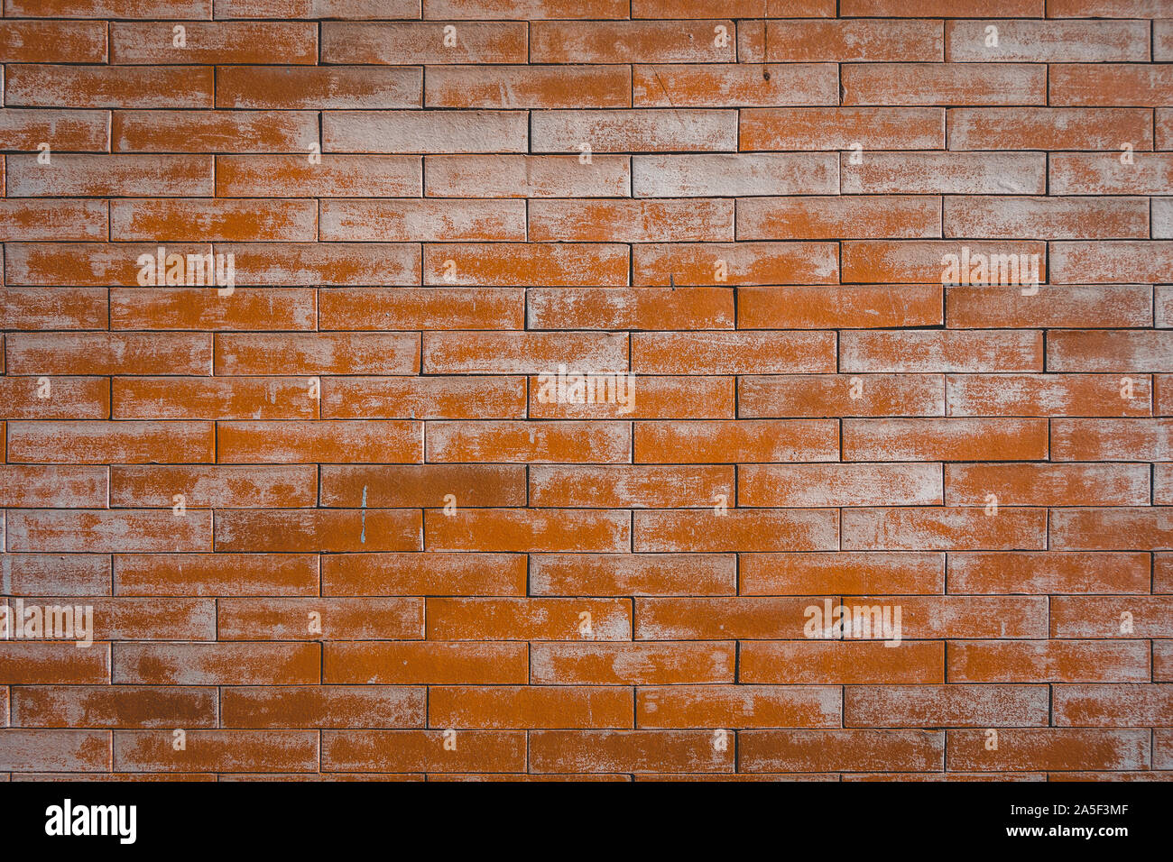 brick facade in warm colors Stock Photo - Alamy