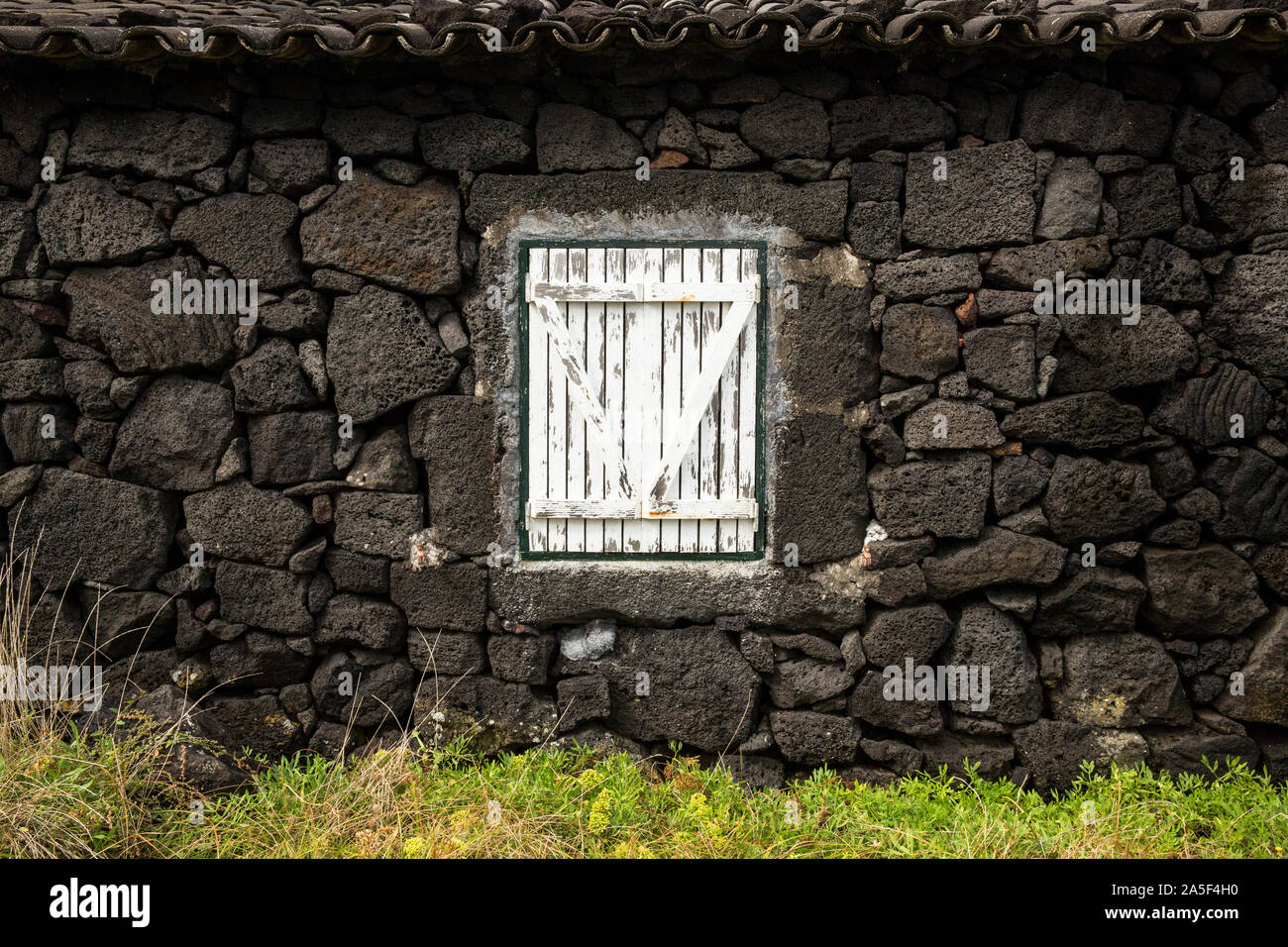 Traditional house made of volcanic rock in Pico. Azores, Portugal Stock ...