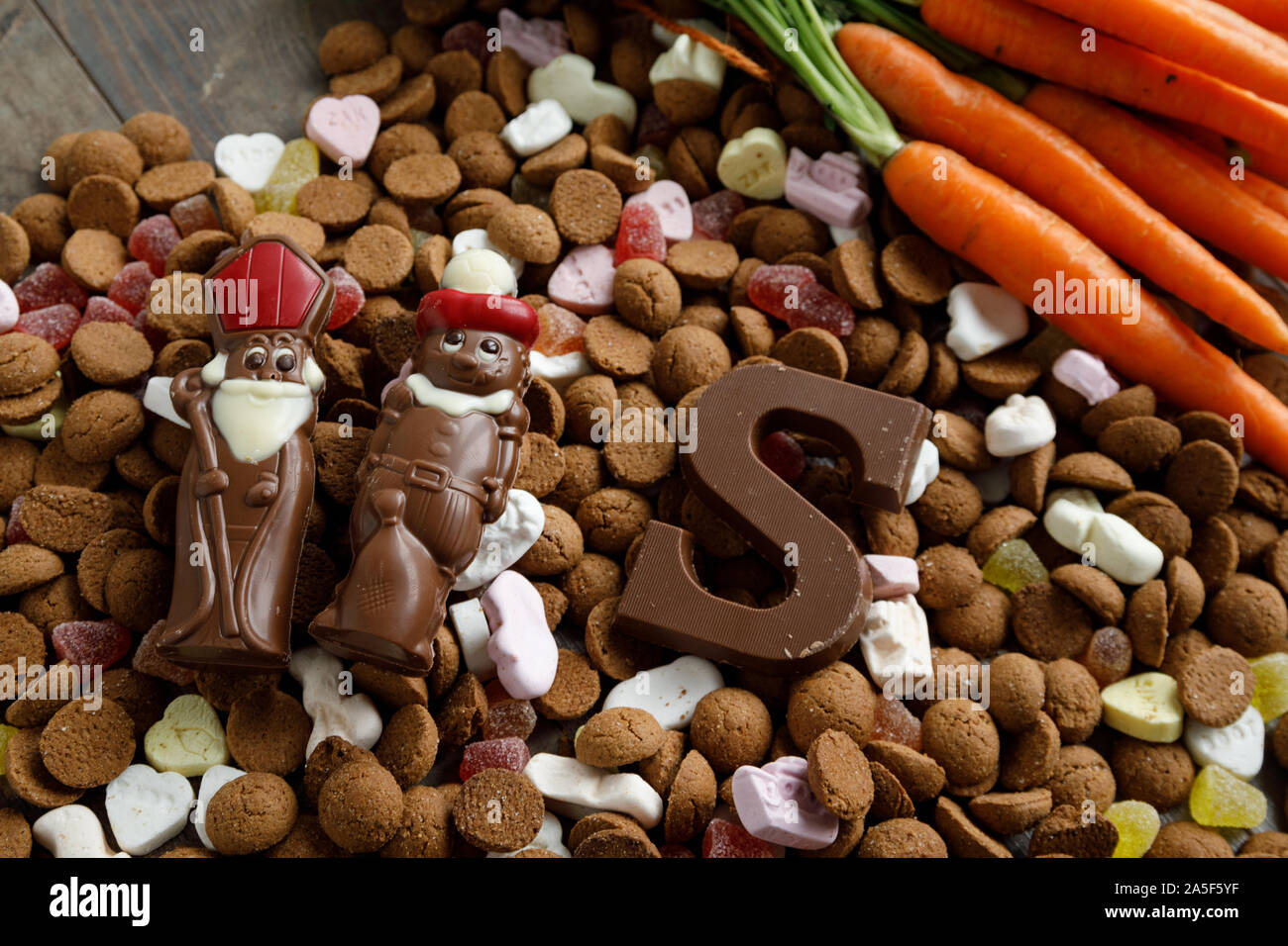 Dutch candy called Pepernoten eaten during Sinterklaas feast. Beside it ...