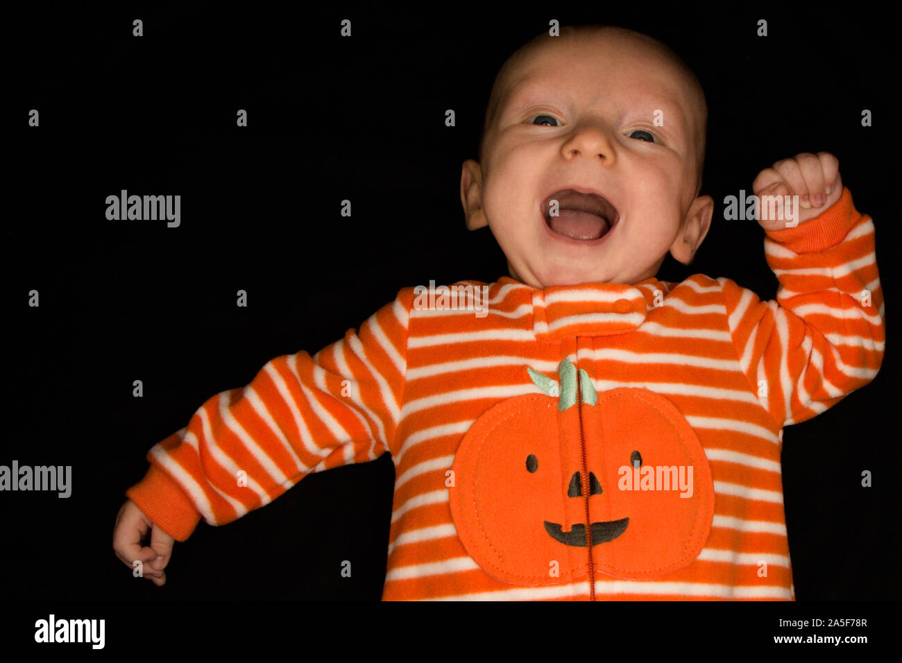 A Three Month Old Baby Poses on a Black Background. Perfect for Memes ...